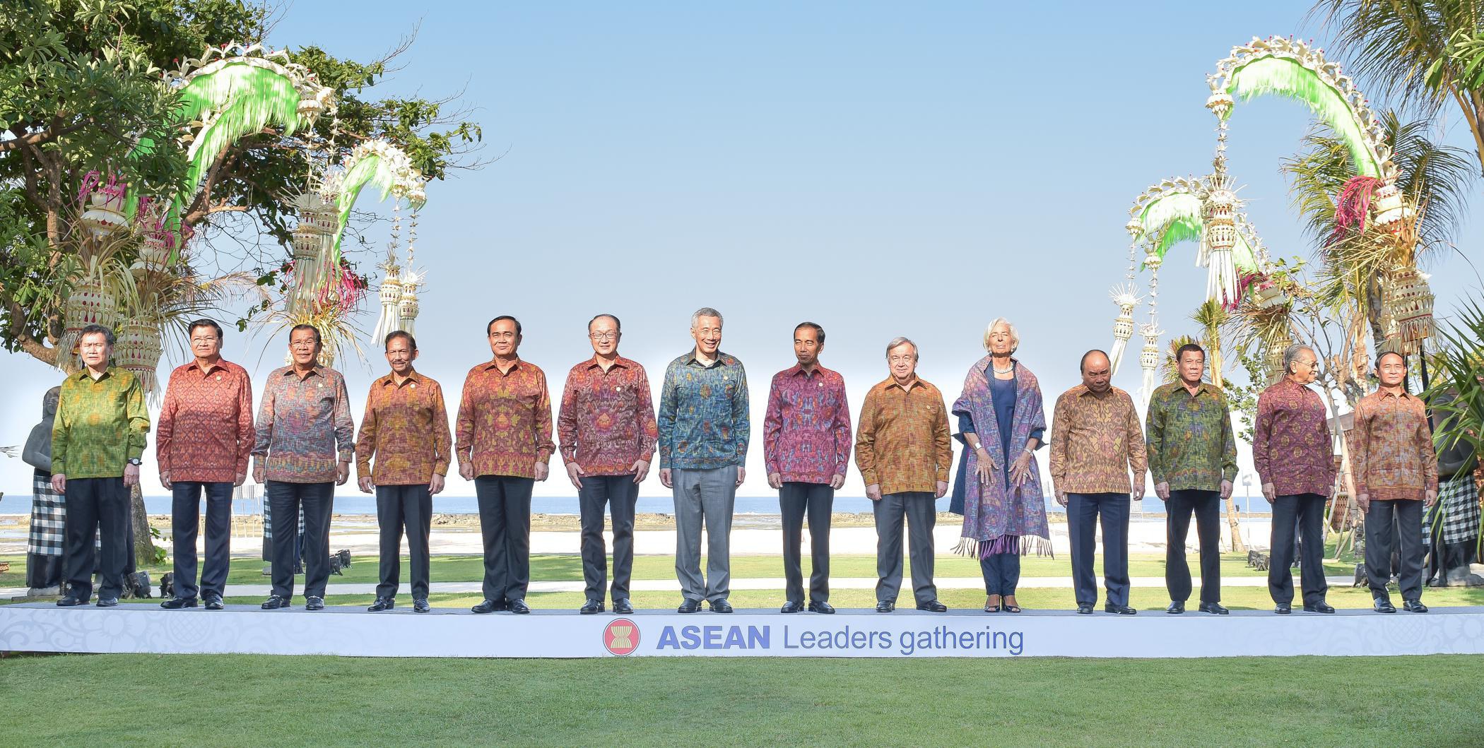 ASEAN leaders vow to uphold free trade, economic integration at Bali ...